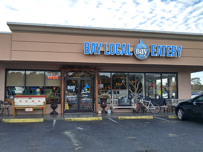 The unassuming exterior hides culinary treasures within. Like finding a pearl in an oyster, Bay Local Eatery's strip mall location belies the seafood magic happening inside.