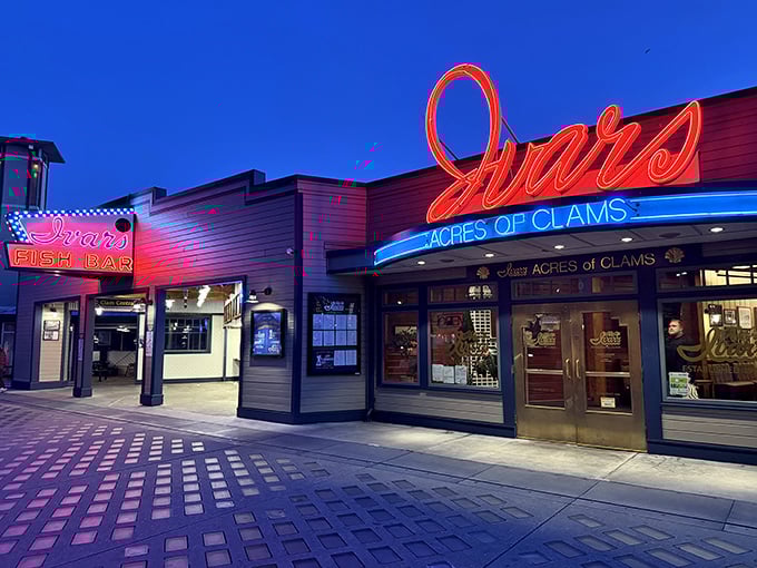 The neon glow of Ivar's iconic sign has been guiding hungry seafood pilgrims to Seattle's waterfront for generations. Resistance is futile.