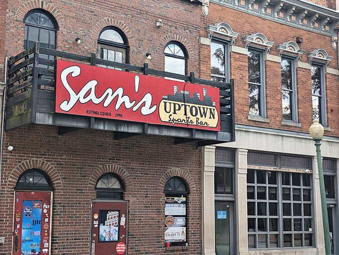 A beacon of flavor in the heart of Charleston! Sam's Uptown Caf&eacute;'s vibrant sign promises a culinary adventure that'll make your taste buds do the Charleston.