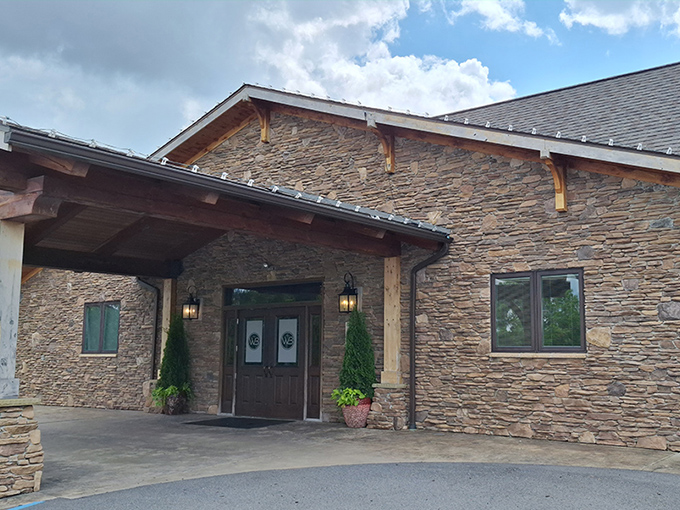 The stone exterior of Wonder Bar stands proudly against West Virginia's blue sky, like a mountain lodge that happens to serve life-changing steaks.