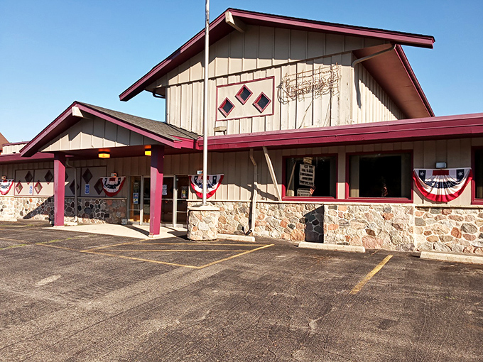 Clifford's vintage sign glows like a beacon for hungry travelers. This unassuming exterior hides Wisconsin's fish fry paradise within.