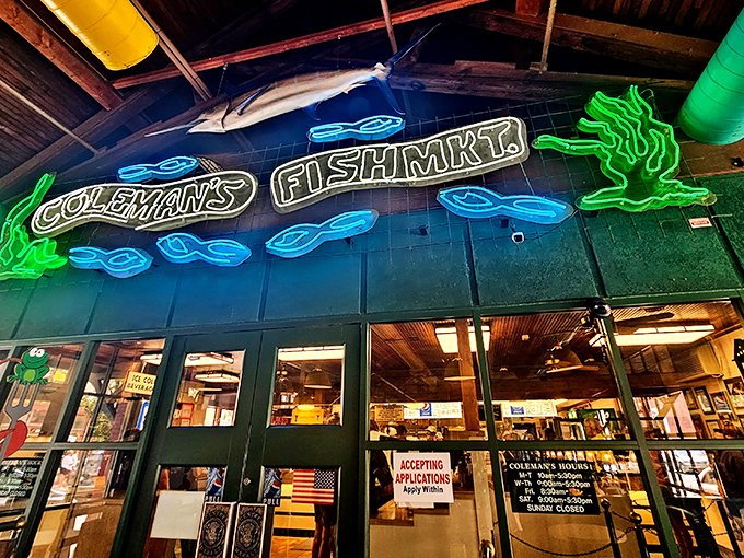 The neon fish sign glows like a beacon of hope for hungry souls. Coleman's exterior promises seafood salvation in the heart of Wheeling.