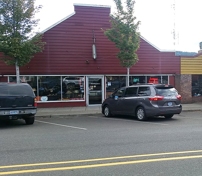 The wagon wheel above the storefront isn't just decoration—it's a time machine invitation to step back into a world where treasures await.