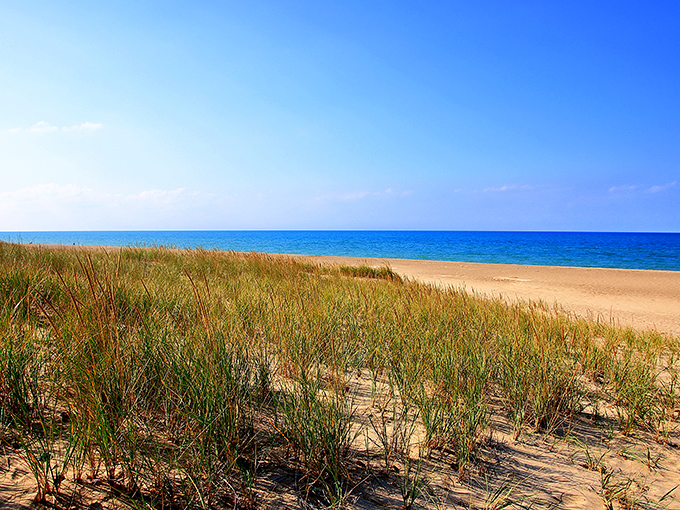 Where the sky meets water in perfect harmony. Lake Michigan's azure waters create a Caribbean-like mirage that makes you forget you're in Indiana.