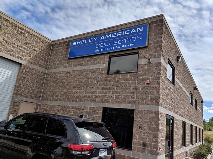 The unassuming exterior of the Shelby American Collection belies the automotive treasures within, like finding a Ferrari dealership inside your neighborhood convenience store.