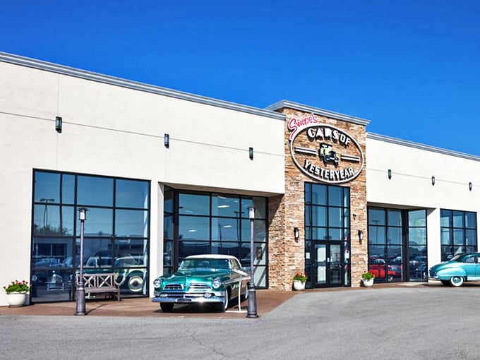 The stone-accented entrance to Swope's Cars of Yesteryear Museum stands like a portal to automotive history, promising chrome-plated treasures within.