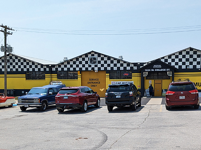 The checkered-flag exterior of Route 66 Car Museum practically screams "START YOUR ENGINES!" &ndash; a roadside beacon for automotive enthusiasts in Springfield.