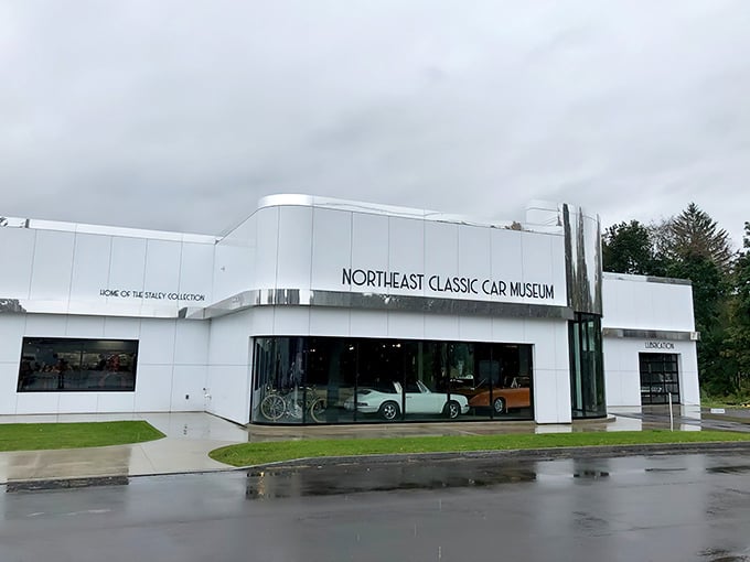 The sleek white exterior of the Northeast Classic Car Museum in Norwich belies the colorful automotive treasures waiting inside, like finding the Louvre in a small-town strip mall.