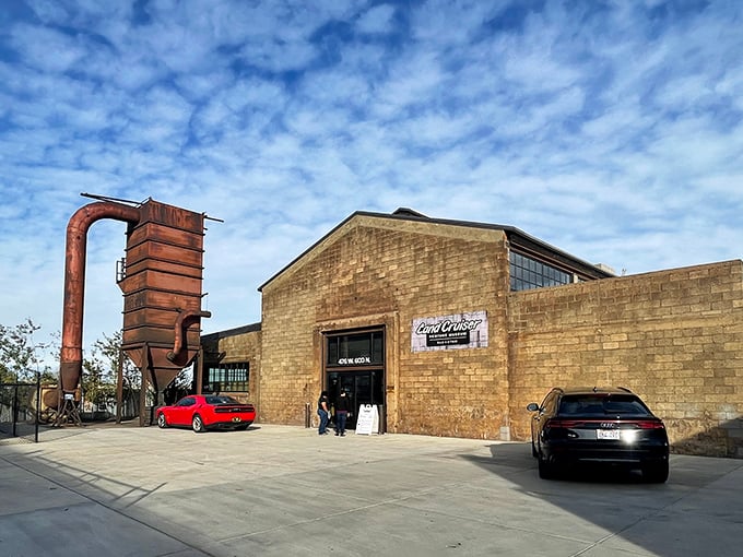 The unassuming brick exterior of the Land Cruiser Heritage Museum hides a treasure trove of automotive history, like finding a Rolex at a yard sale.