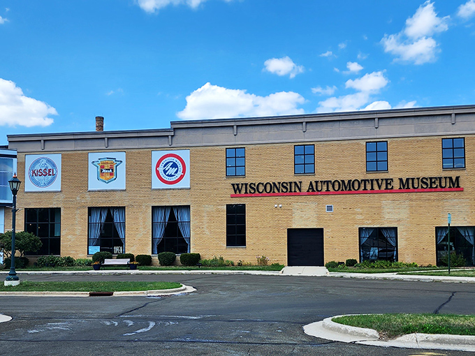 The Wisconsin Automotive Museum's exterior proudly displays its automotive heritage with vintage car logos. Like finding a treasure chest of chrome and nostalgia in Hartford's backyard.