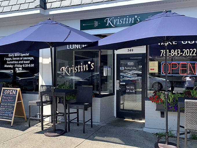 The inviting storefront of Kristin's promises breakfast paradise with its charming navy umbrellas and Early Bird Special that might make you do a double-take at the wallet-friendly prices.