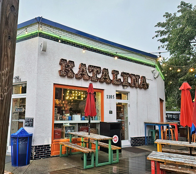 The marquee-style sign beckons like a carnival of culinary delights, promising pancake balls that are worth every minute of the inevitable wait.