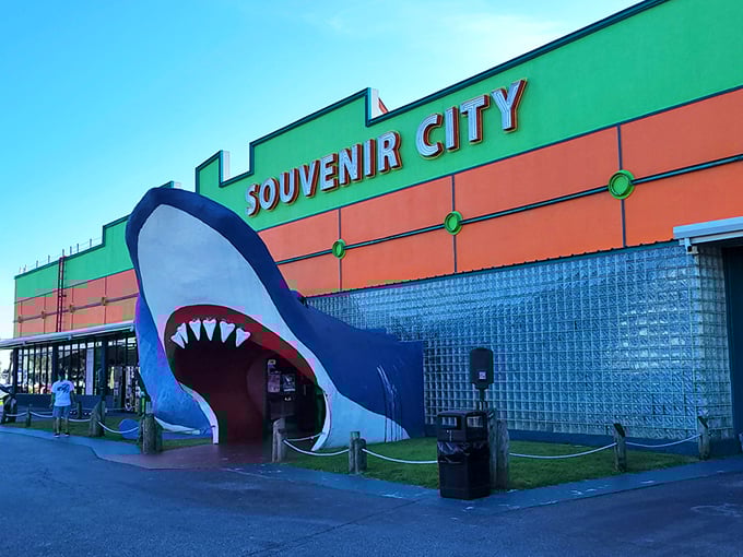 The iconic shark entrance at Souvenir City isn't subtle&mdash;it's vacation architecture at its finest. Walking through those jaws is practically a Gulf Shores rite of passage!