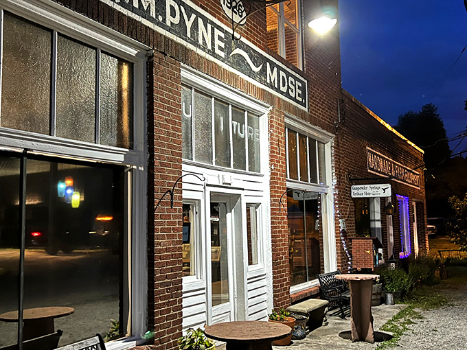 The historic O.M. Pyne building stands as a culinary time machine in tiny Eggleston. Red brick, weathered benches, and small-town charm set the stage for an extraordinary meal.