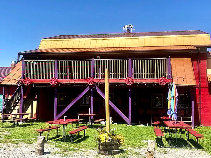 The architectural equivalent of a carnival barker's promise: "Step right up to the greatest steak show on earth!" Cuz's colorful exterior doesn't whisper, it shouts.