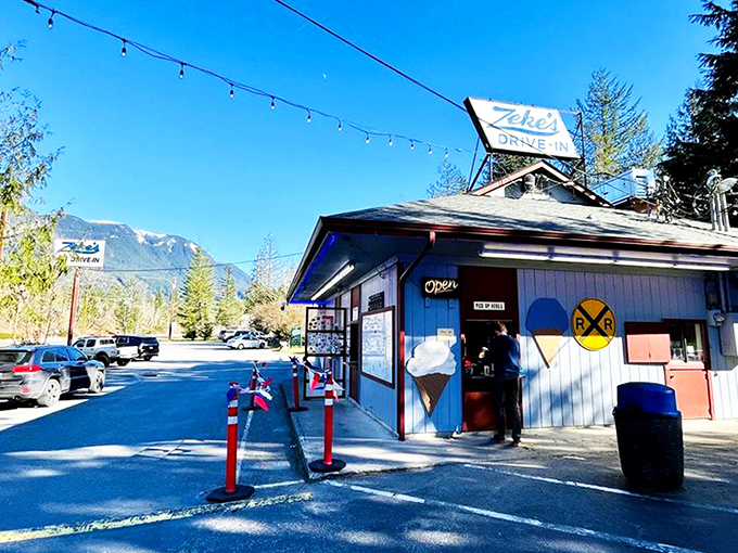 Simplicity at its finest: The iconic blue and white Zeke's sign beckons hungry travelers like a lighthouse for those navigating the sea of Highway 2 hunger pangs.