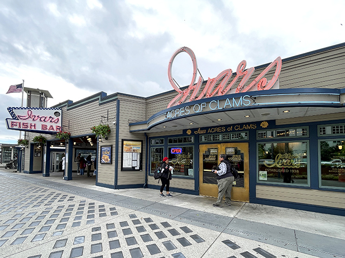 The neon glow of Ivar's iconic sign has been guiding hungry seafood pilgrims to Seattle's waterfront for generations. Resistance is futile.