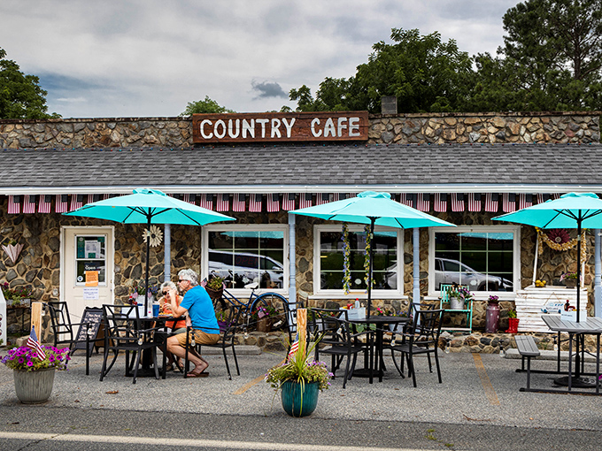 The stone exterior of Country Caf&eacute; stands like a culinary fortress in Harpers Ferry, promising comfort food treasures within those rustic walls.