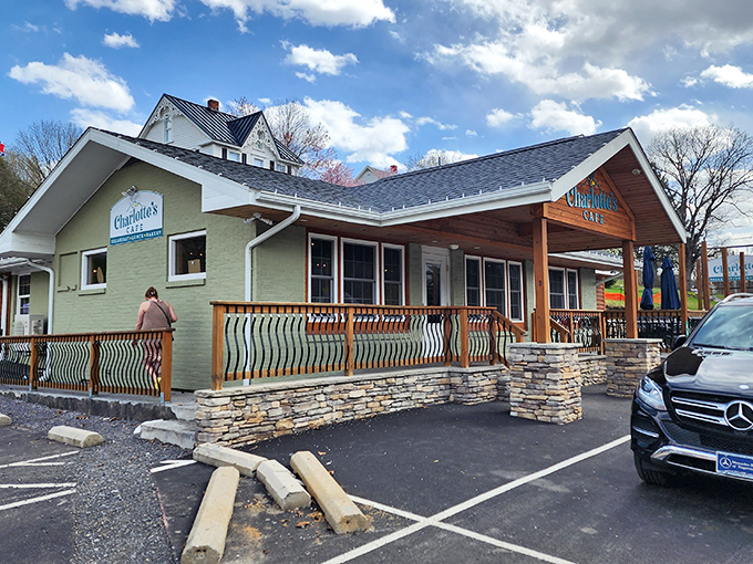 The welcoming wooden facade of Charlotte's Cafe beckons like an old friend, promising comfort and culinary delights within its cozy walls.
