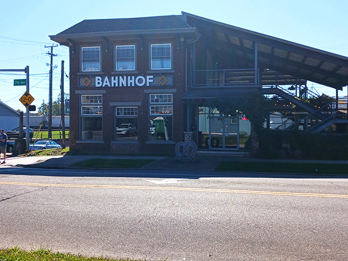 Bahnhof's brick exterior beckons like a portal to Bavaria, complete with that unmistakable pretzel sculpture that says, "Yes, carb-lovers, this is your happy place."