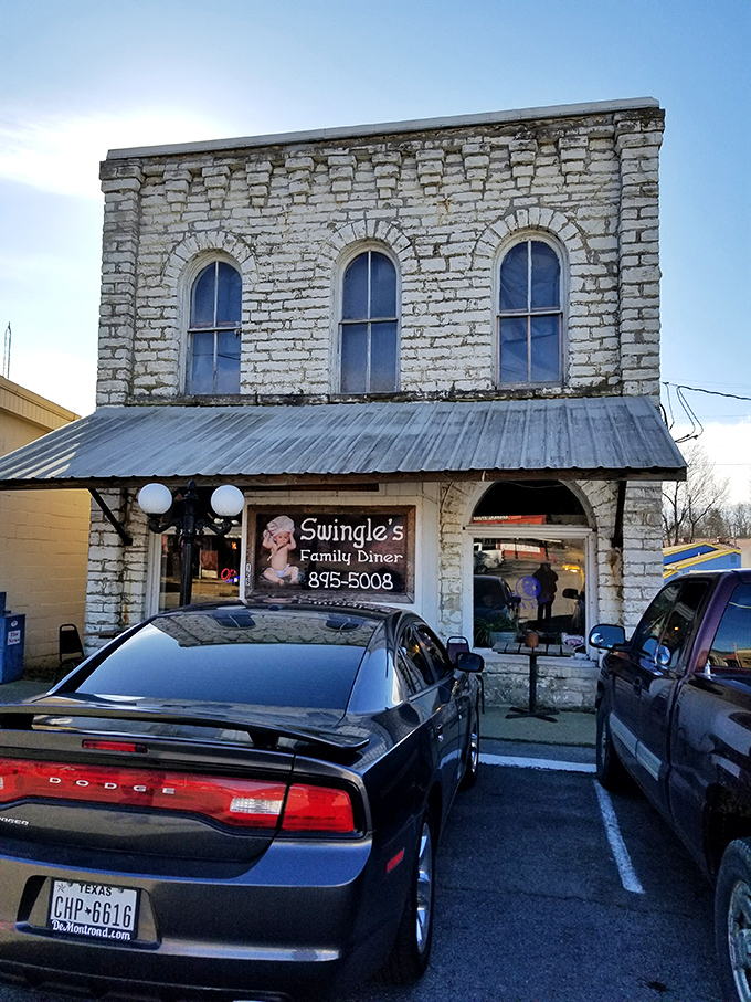 The historic limestone facade of Swingle's stands proudly in Salem, a time-honored beacon for breakfast pilgrims seeking salvation through perfect pancakes.