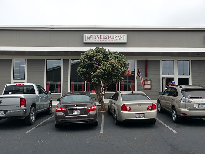 The unassuming storefront that launches a thousand breakfast dreams. American flag proudly waving, as if announcing: "Patriotism and pancakes served here!"