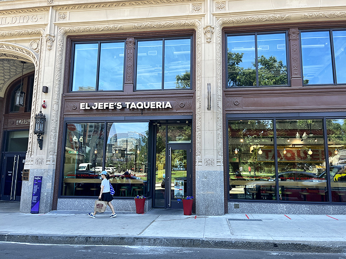 El Jefe's Taqueria nestles into Boston's historic architecture, its black circular sign beckoning hungry explorers like a taco lighthouse in a sea of brick and granite.