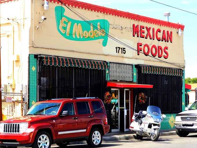 The unassuming turquoise and white facade of El Modelo stands like a culinary lighthouse in Albuquerque's Barelas neighborhood, beckoning hungry souls for generations.