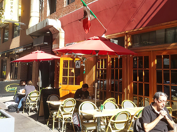 The crimson awning of Tajin beckons like a culinary lighthouse in the urban sea, promising authentic Mexican flavors behind those welcoming doors. 