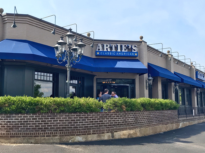 Artie's classic blue awnings and elegant exterior welcome you like an old friend who happens to make the best prime rib in Virginia.