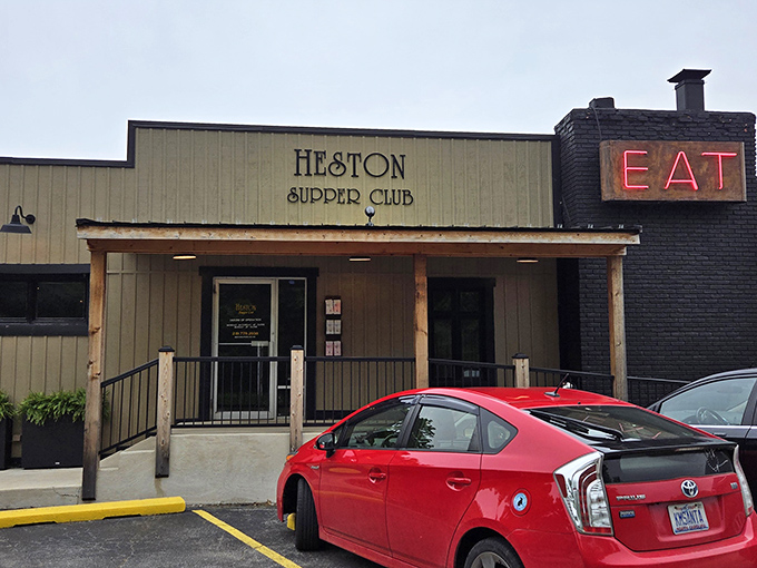 The unassuming exterior of Heston Supper Club beckons like an old friend, promising comfort and satisfaction behind its wooden facade.