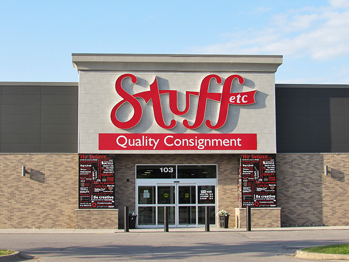 The iconic red Stuff Etc sign stands out like a beacon for bargain hunters, promising treasures within those brick walls.