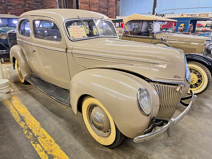 The 1939 Ford Deluxe's creamy exterior and perfect proportions showcase why these classics never go out of style. Timeless beauty on four wheels.