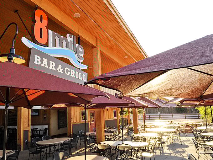 8 Mile Bar & Grill's inviting patio practically whispers "cold beer here" after a day of exploring gorges, prisons, and dinosaur tracks.