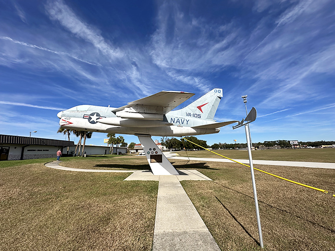 Even the sky wasn't the limit for speed enthusiasts. This Navy aircraft stands sentinel outside, reminding visitors that going fast isn't just a ground game.