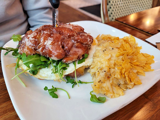 The Apple Frittwich with those cheesy hash browns on the side is what happens when comfort food gets a PhD.