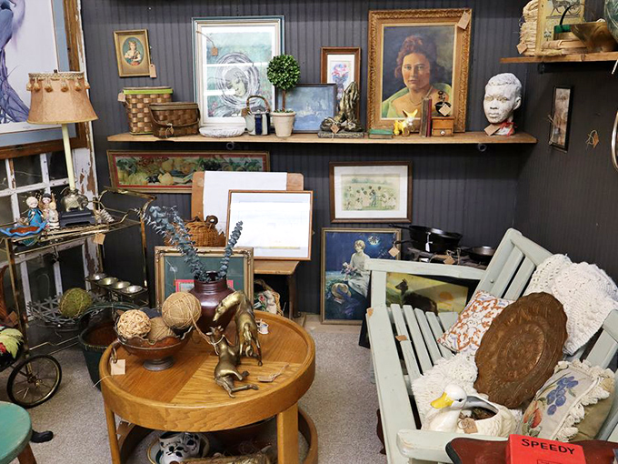 Art that doesn't match your sofa &ndash; the best kind! This eclectic gallery wall features everything from pastoral scenes to portraits with penetrating gazes.