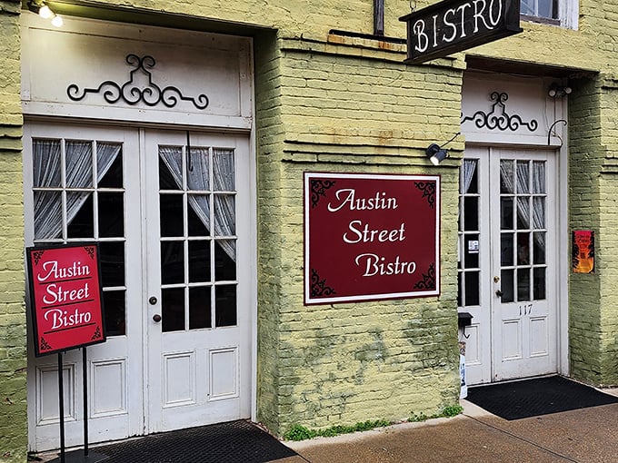 Austin Street Bistro's pale yellow facade and French doors whisper "come in and linger" in a world that usually screams "grab and go."