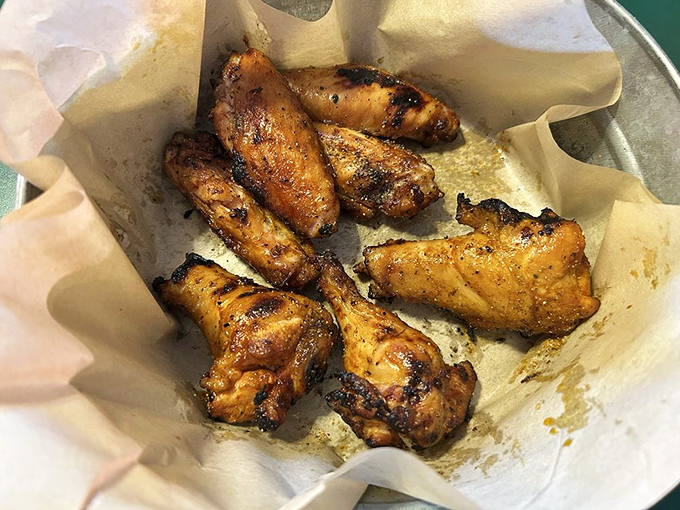 These wings have more character development than most Netflix series. Perfectly charred, glistening with sauce&mdash;they're ready for their close-up.