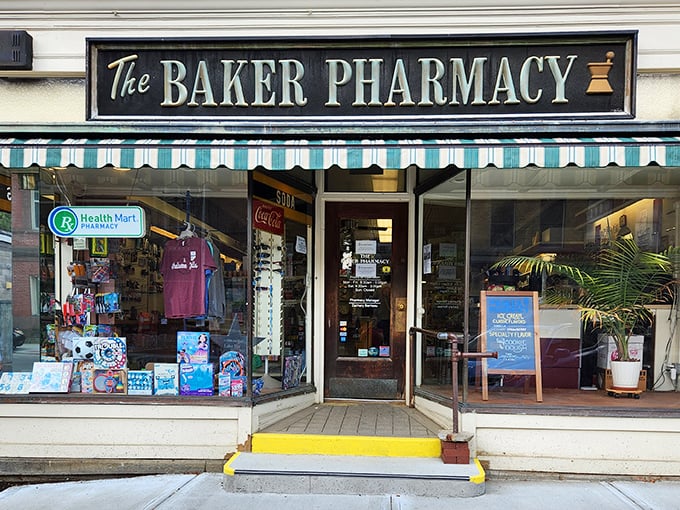 The Baker Pharmacy's vintage storefront promises the kind of personal service where they might still remember your name and your preferred cough drop flavor.