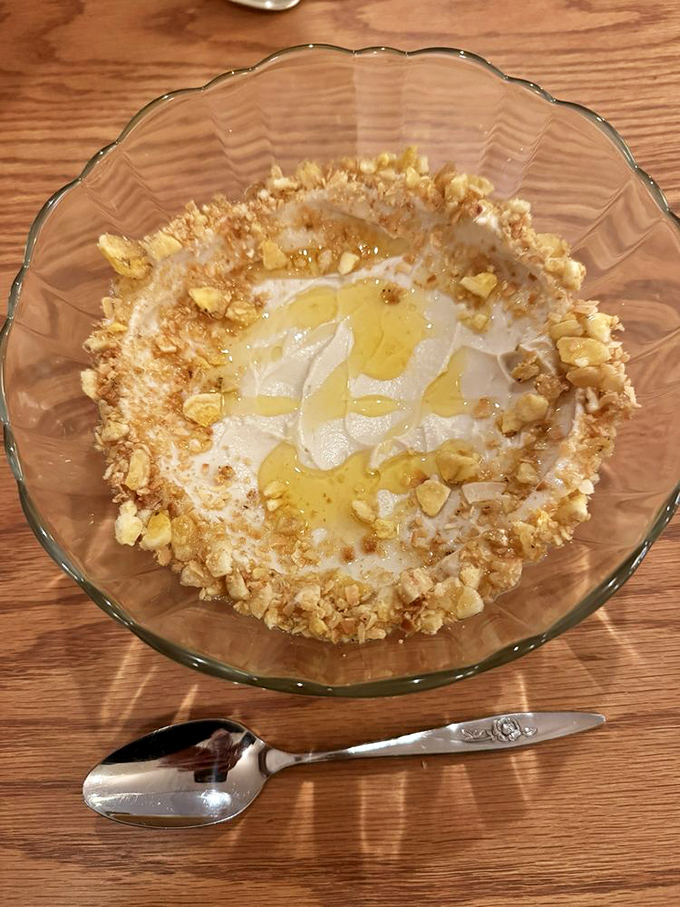Banana pudding elevated to an art form, with crushed vanilla wafers creating a halo of crunch. Comfort food that graduated with honors.