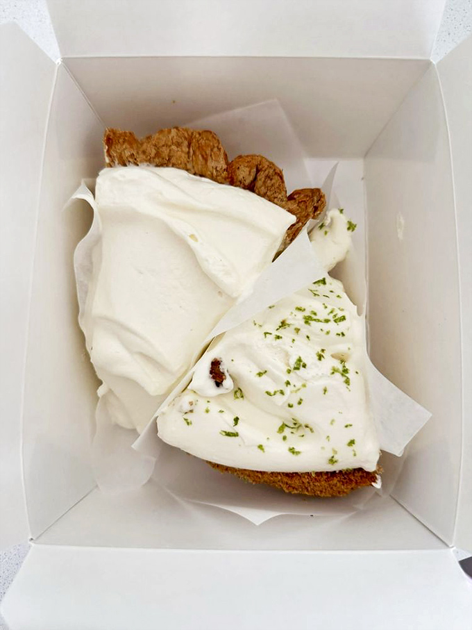 Two slices of heaven in checkered paper boats. The banana cream and key lime pie create the ultimate dessert dilemma.