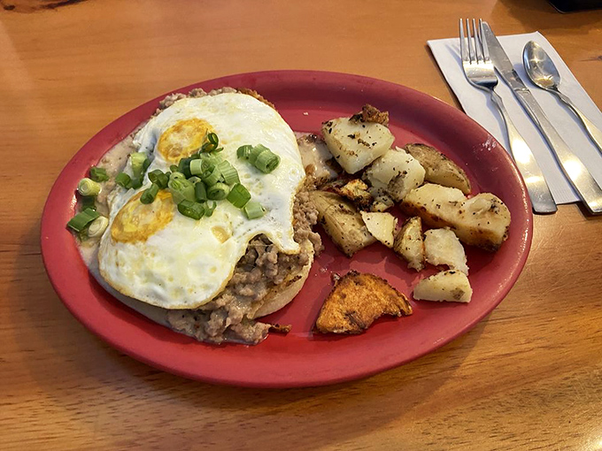 Biscuits and gravy with sunny-side eggs&mdash;breakfast's version of a perfect day at the beach, minus the sand in uncomfortable places.