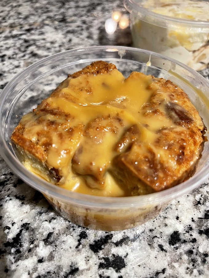 Bread pudding swimming in a sauce so good you'll be tempted to ask for a straw. Dessert or breakfast? At this point, who's keeping score?