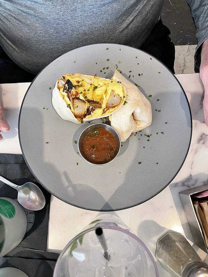 This breakfast burrito didn't just roll out of bed looking this good. It's packed tighter than a Hot Springs tourist spot on a holiday weekend.