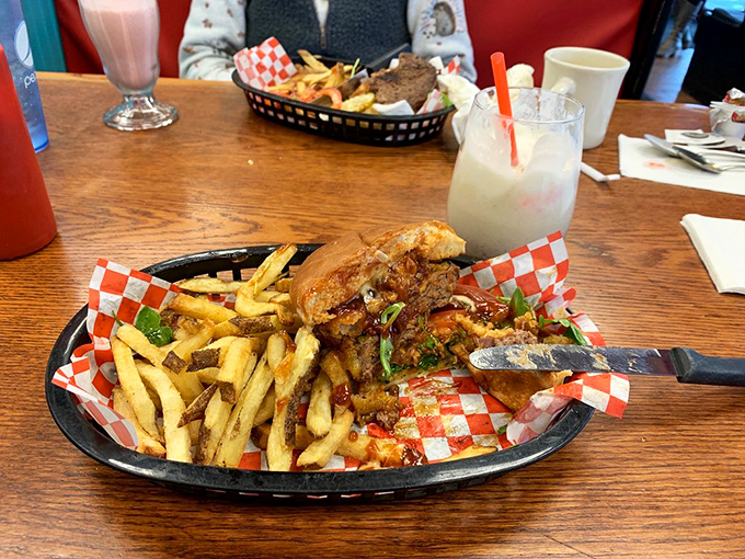 The perfect burger-to-fry ratio on a classic red basket. This isn't just lunch&mdash;it's a mathematical equation solved to delicious perfection.