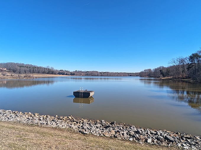 Tranquil waters of Cane Creek Lake mirror the sky &ndash; fishing, relaxation, and sunset views that outperform any streaming service.