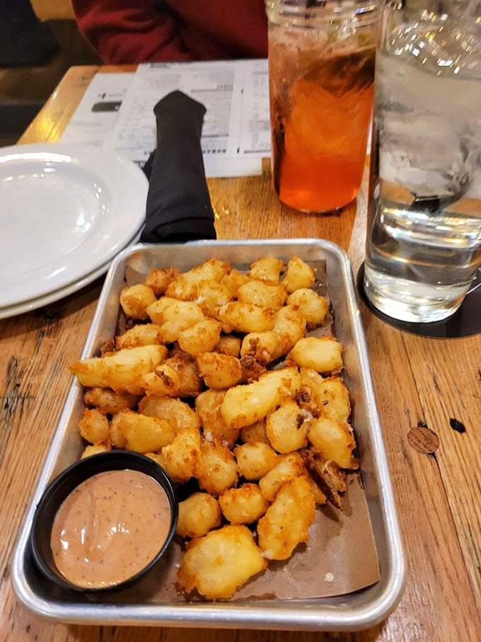 Cheese curds: the unsung heroes of the appetizer world. Crispy outside, melty inside, and served with a sauce that deserves its own fan club.
