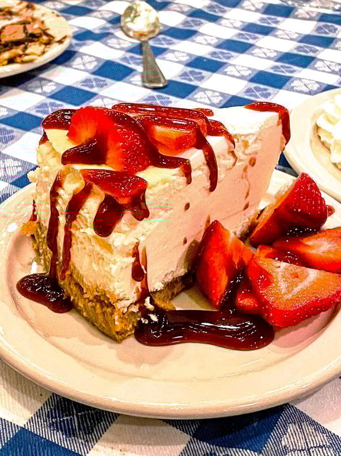 A slice of strawberry cheesecake that's dressed for the red carpet. Diet plans surrender at first glance.