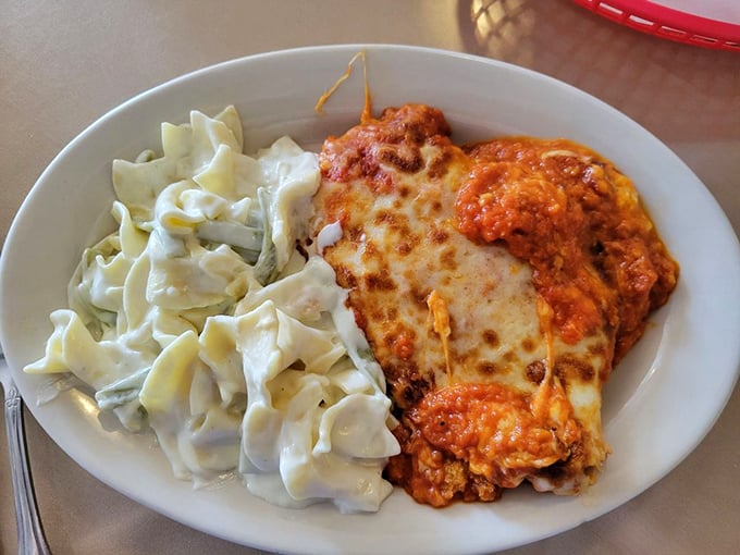 Chicken parmesan with a side of fettuccine that proves sometimes the classics become classics for a very good reason.